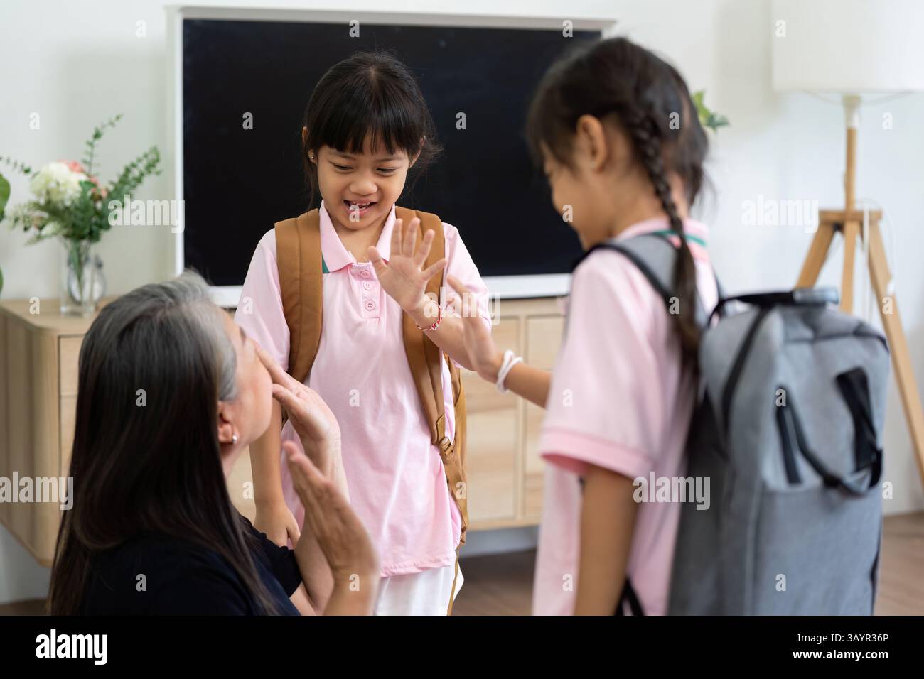 Joyful Farewell and School Day. Children waving goodbye to their ...