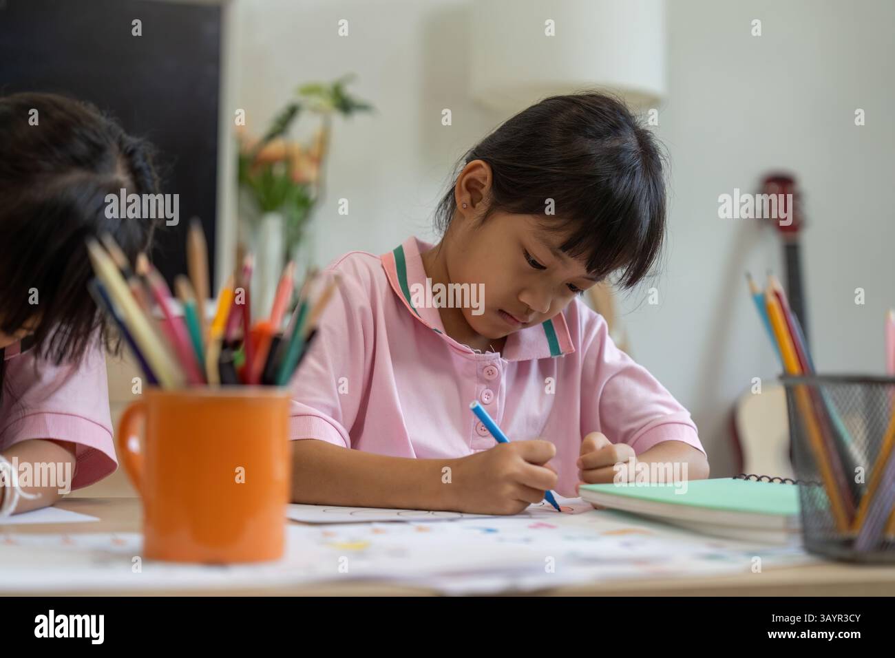 Focus learning girl deeply hi-res stock photography and images - Alamy