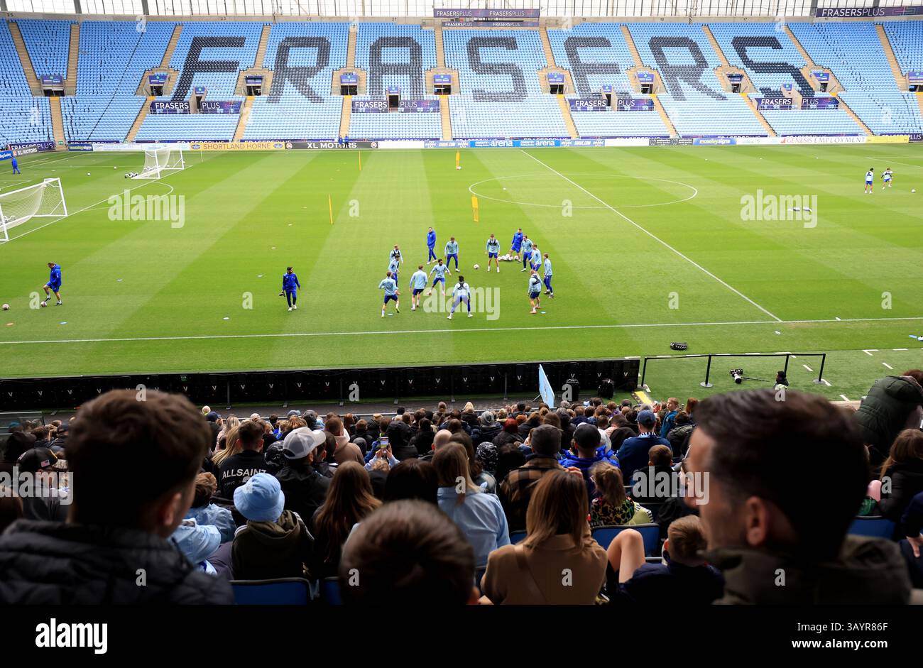 Coventry City fans spectate a training session at the Coventry Building ...