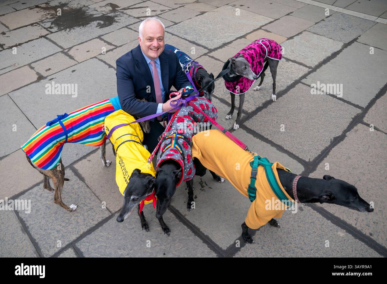 Scottish Green MSP Mark Ruskell with former racing greyhounds outside ...