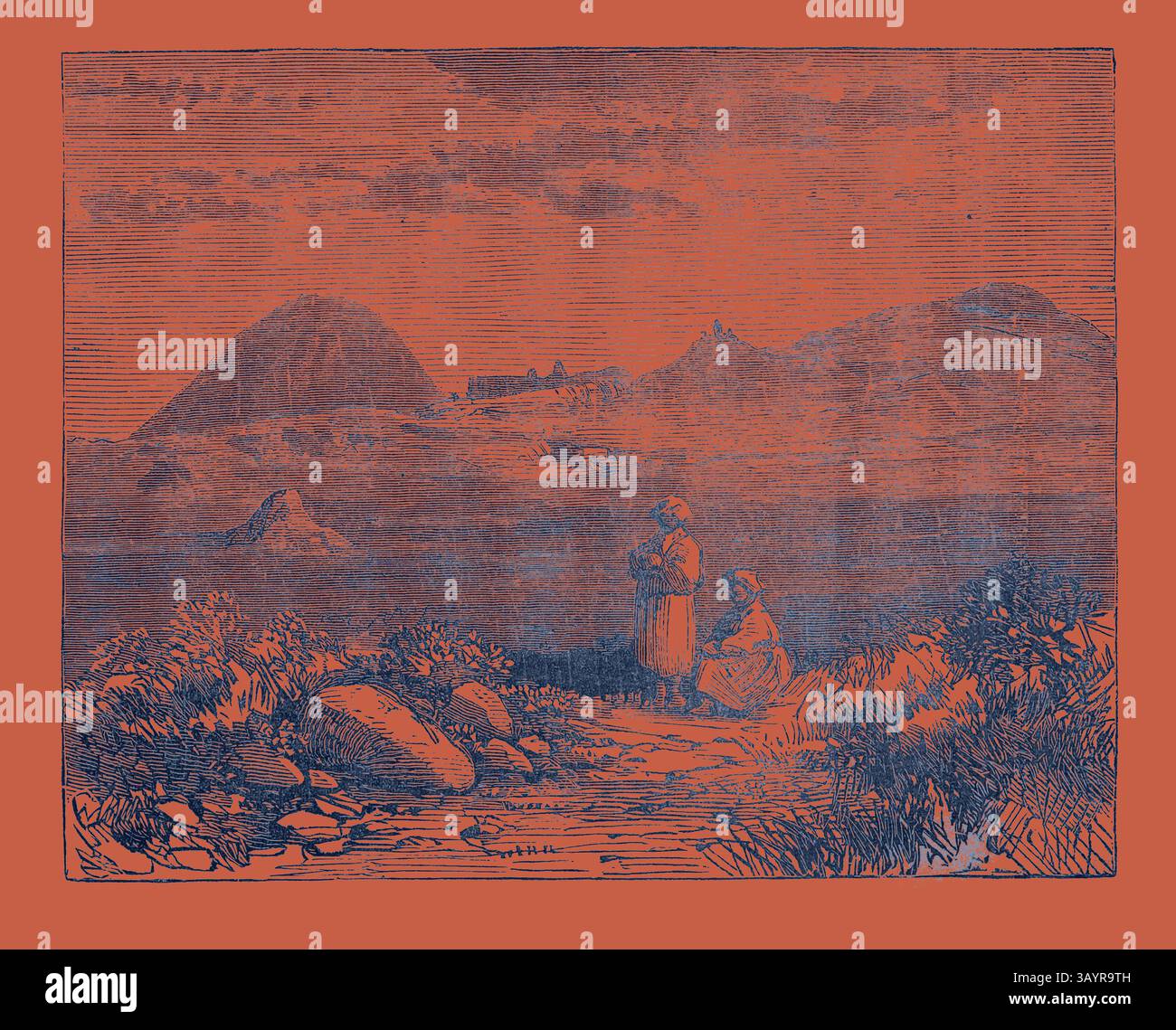 Two figures stand near a rocky path, gazing out towards distant hills ...