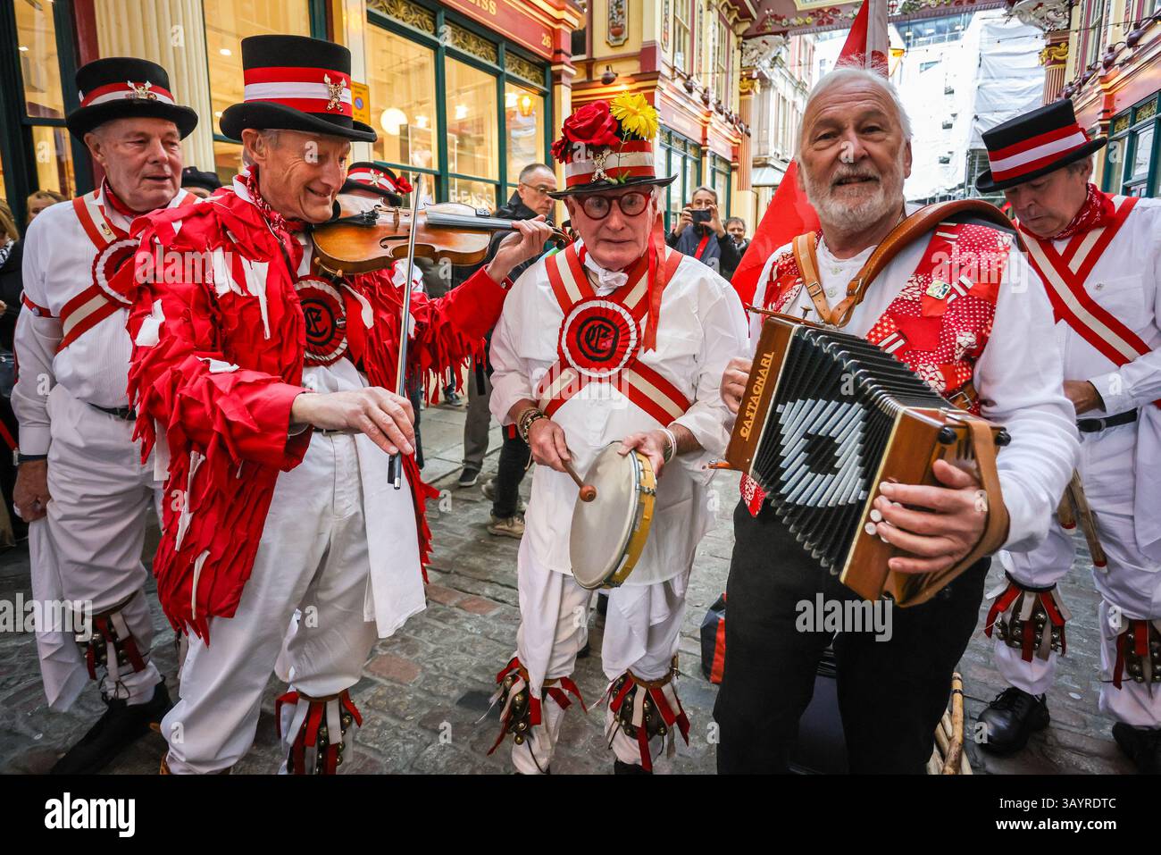 London, UK. 23rd Apr, 2025. The Ewell St Mary's Morris Men perform in ...