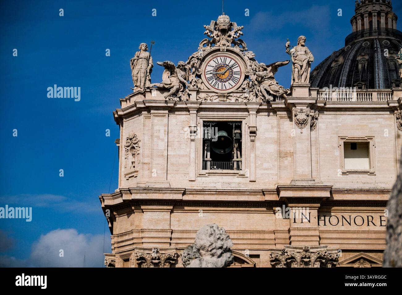 The bell tolls funeral chimes during Pope Francis' body is carried in a ...