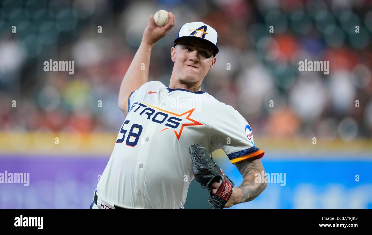Houston Astros starting pitcher Hunter Brown (58) delivers against the ...