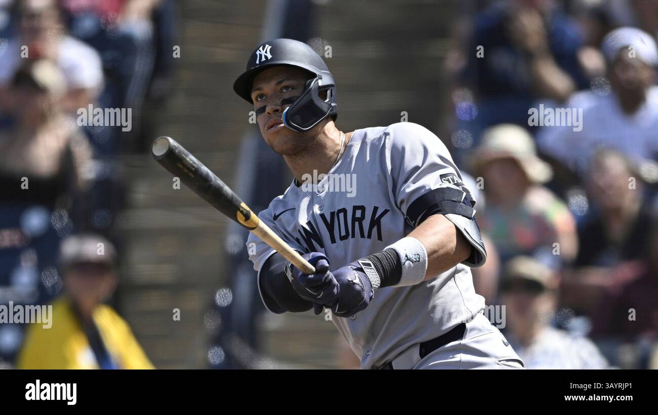 New York Yankees' Aaron Judge watches the flight of the ball as it is ...