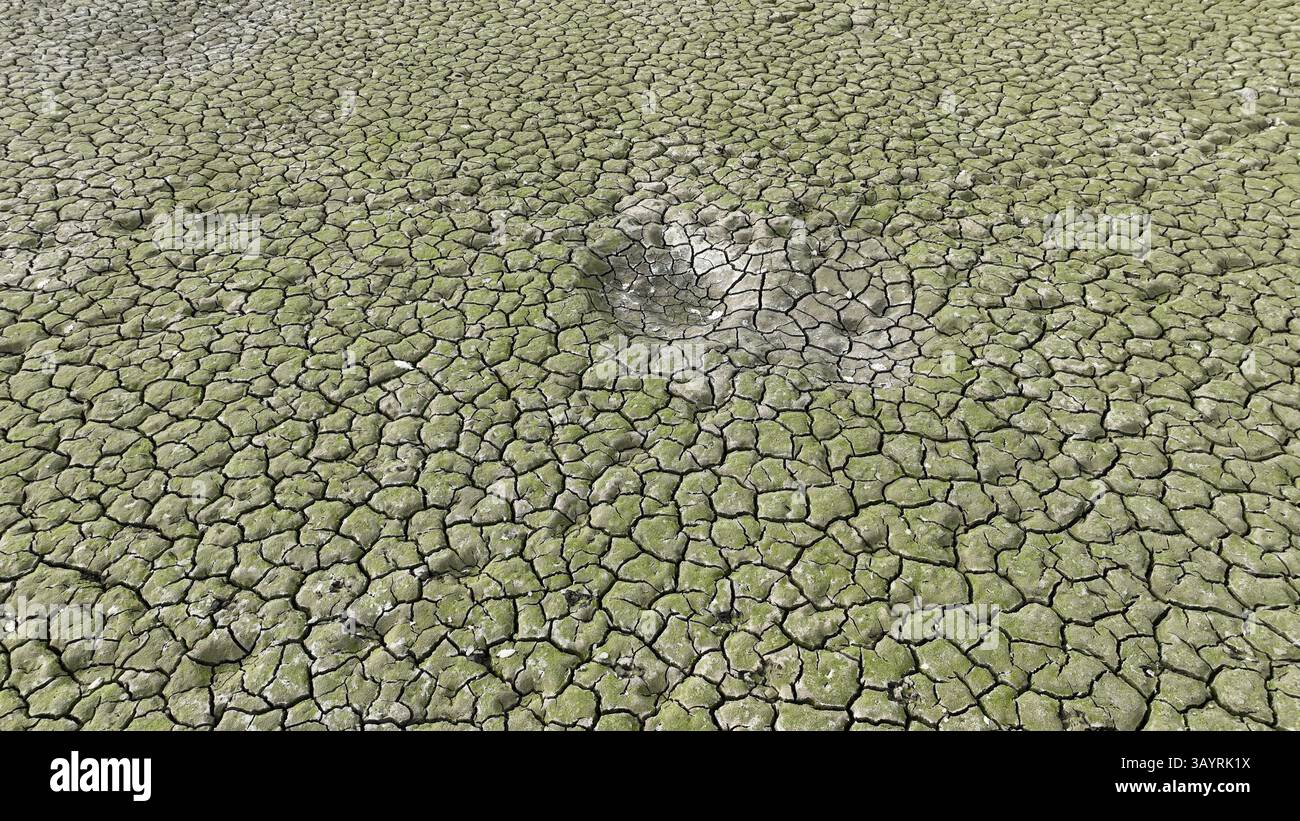 Drought cracked pond soil crust wetland water, swamp drone aerial ...