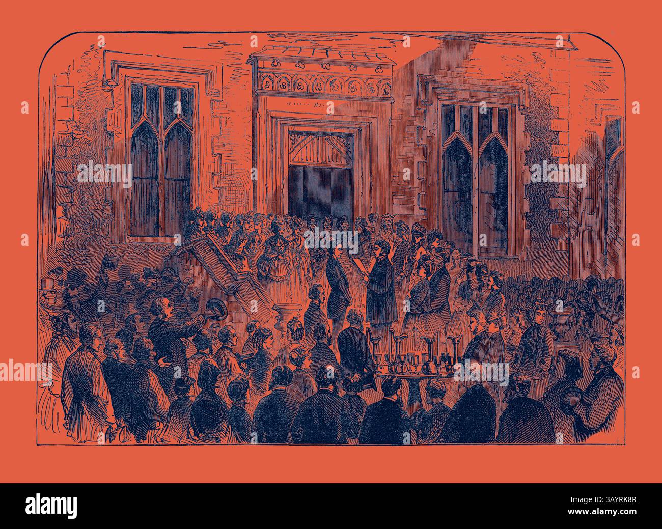 A crowded hall filled with an audience captivated by a performance at ...