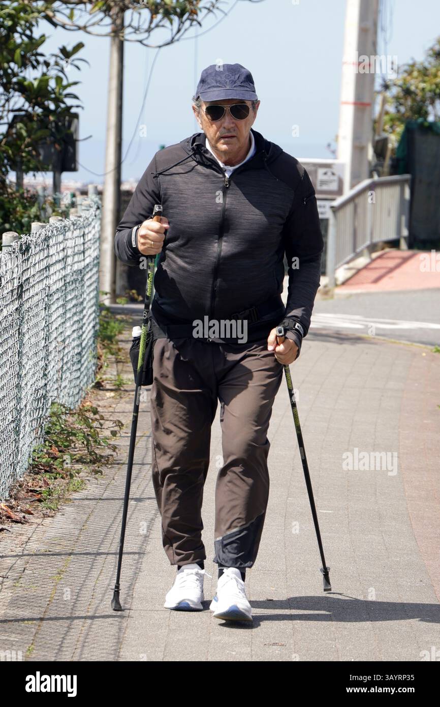 Pedro Campos goes for a walk while King Juan Carlos remains at home, on ...