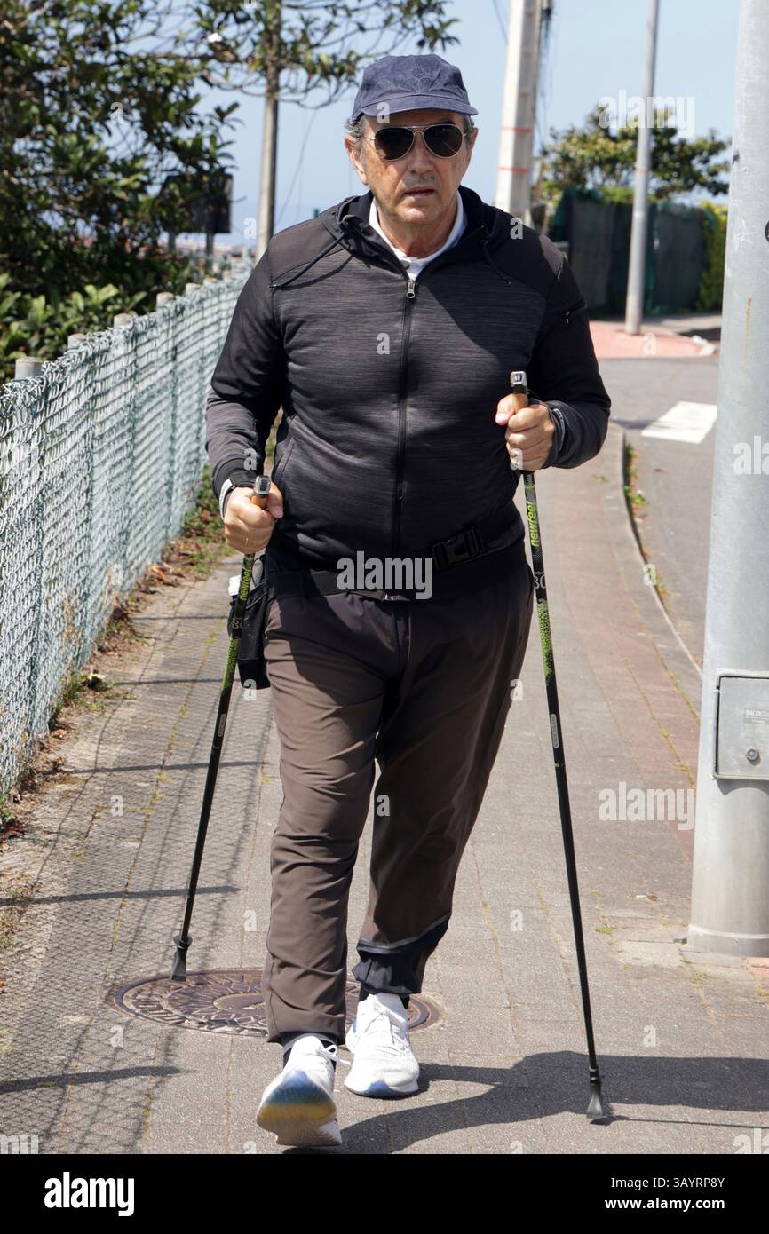Pedro Campos goes for a walk while King Juan Carlos remains at home, on ...