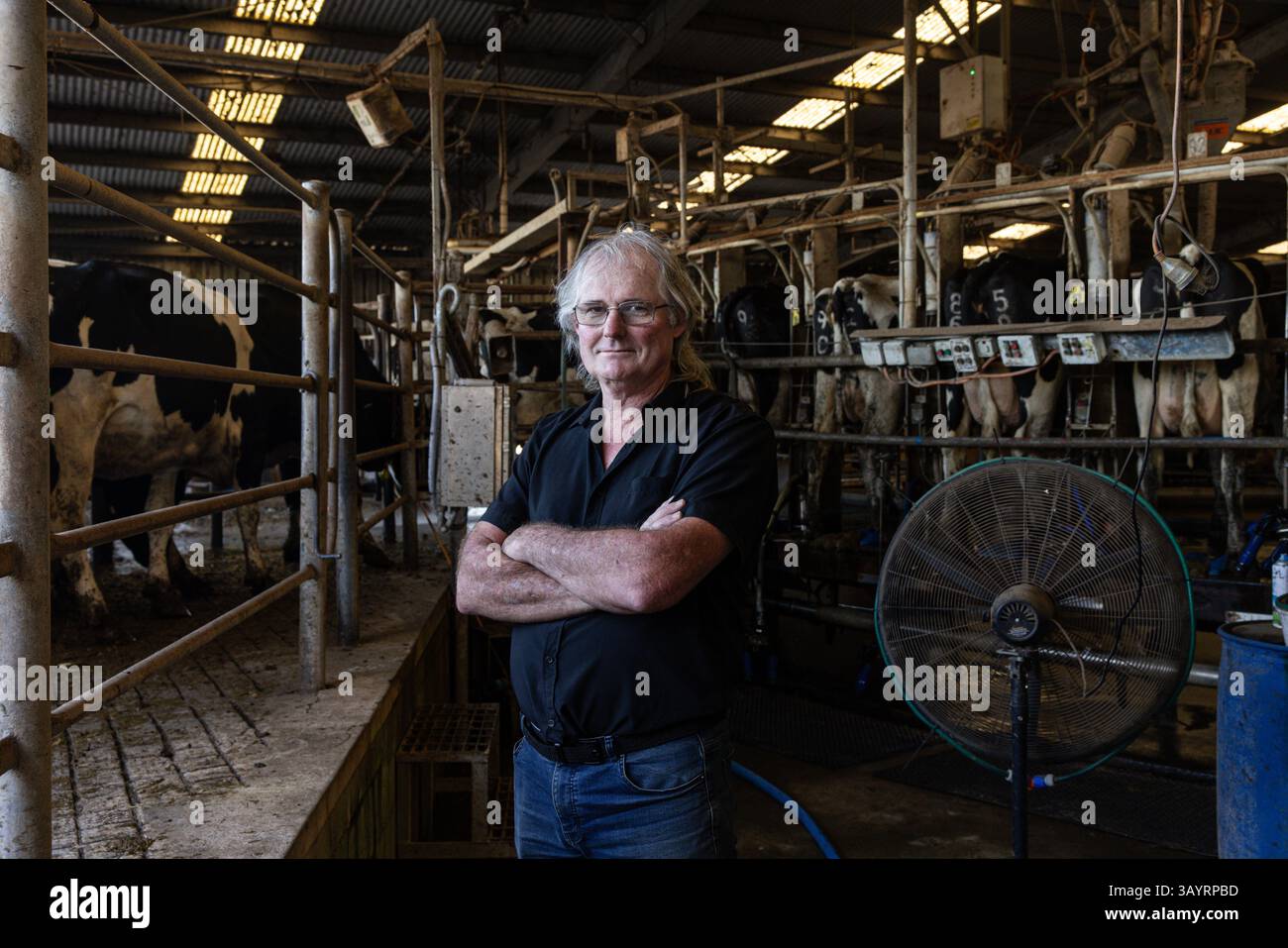 Windslow, Australia. 23rd Apr, 2025. Dairy farmer Bernie Free poses for ...