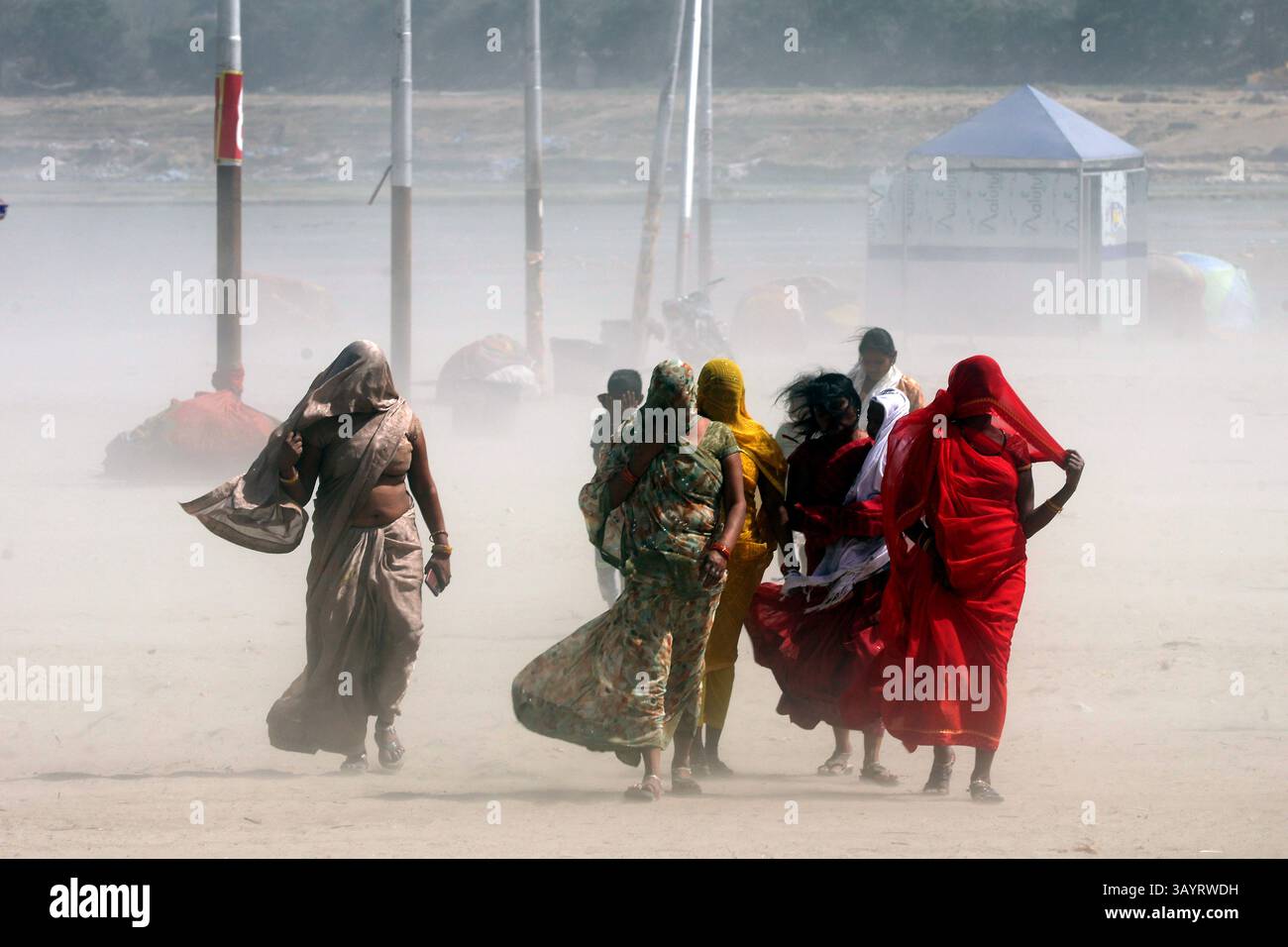 Prayagraj, India. 23 April 2025, people brave heat wave conditions ...
