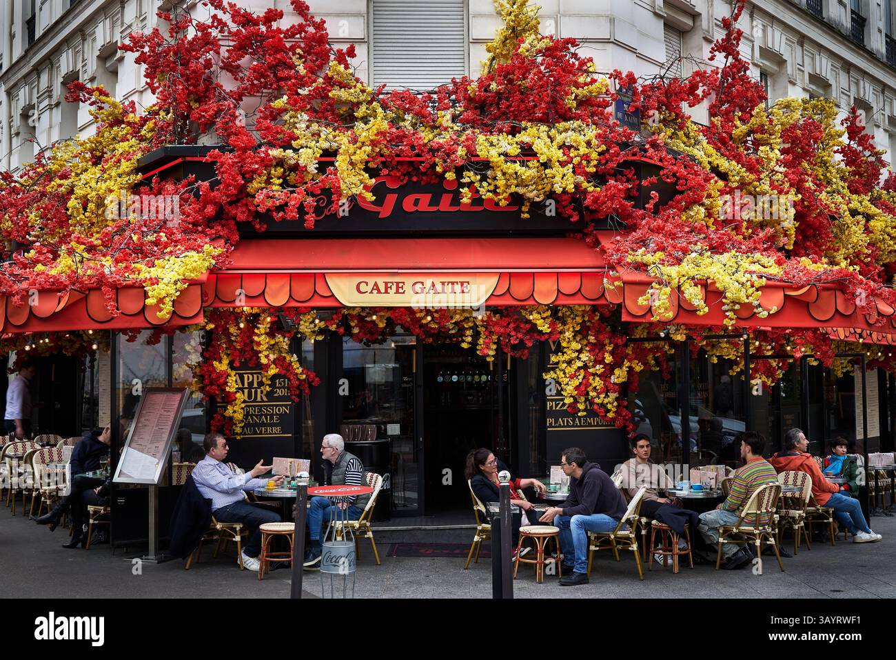 Café Gaite restaurant with typical with a flower facade, french ...
