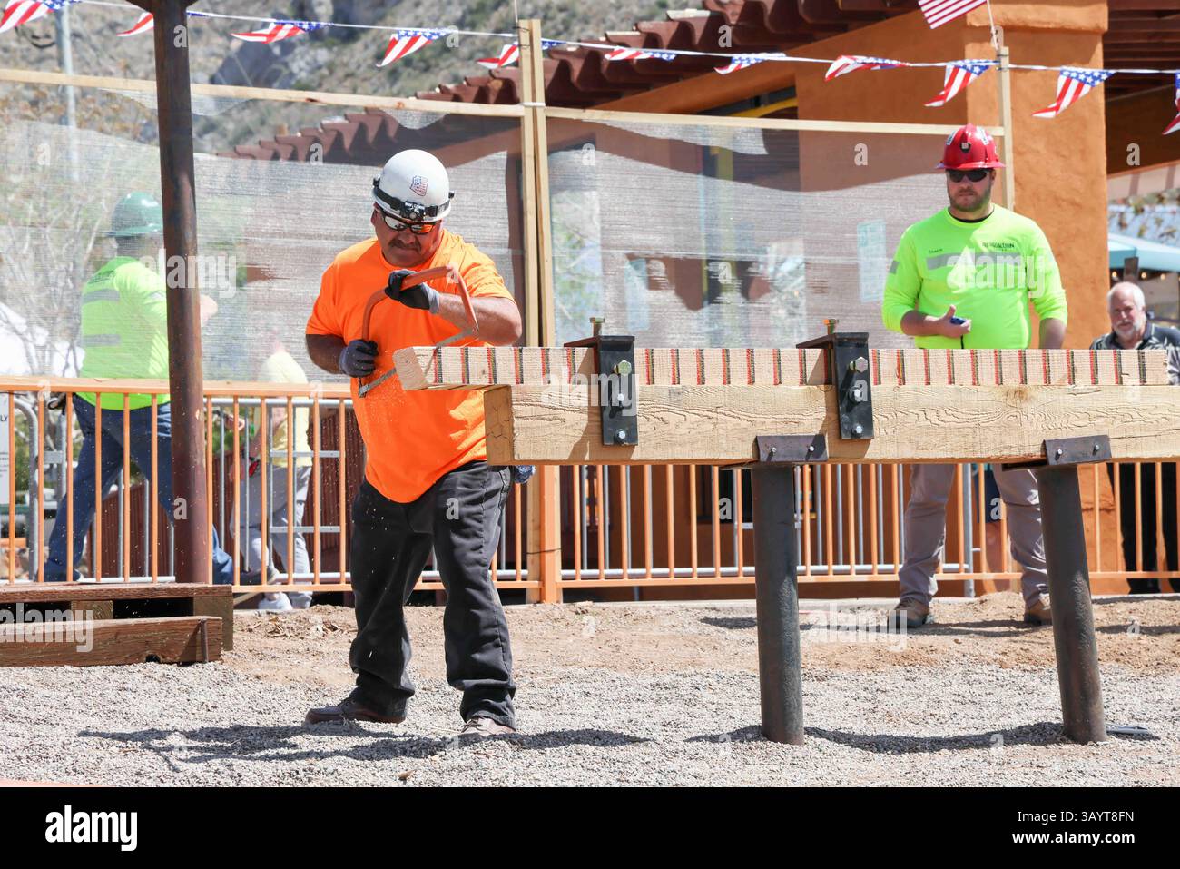 Contestants compete at the hand sawing part of the Mining Competition ...