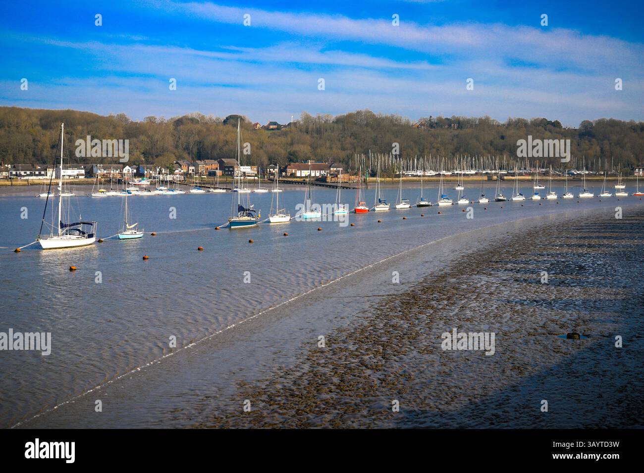Small boats lined up along the River Medway between historic Upnor and ...