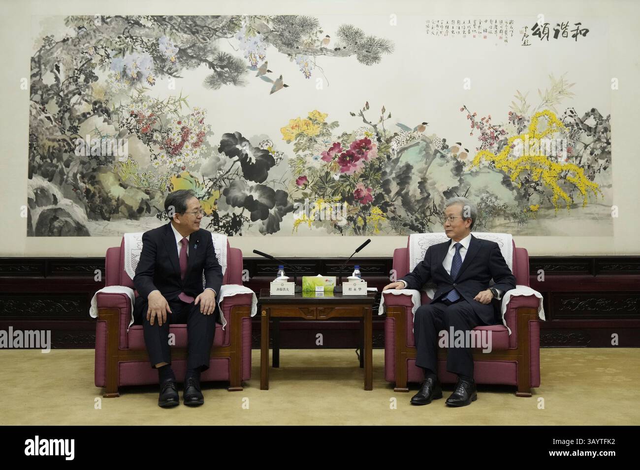 Cheng Yonghua (R), executive vice president of the China-Japan ...
