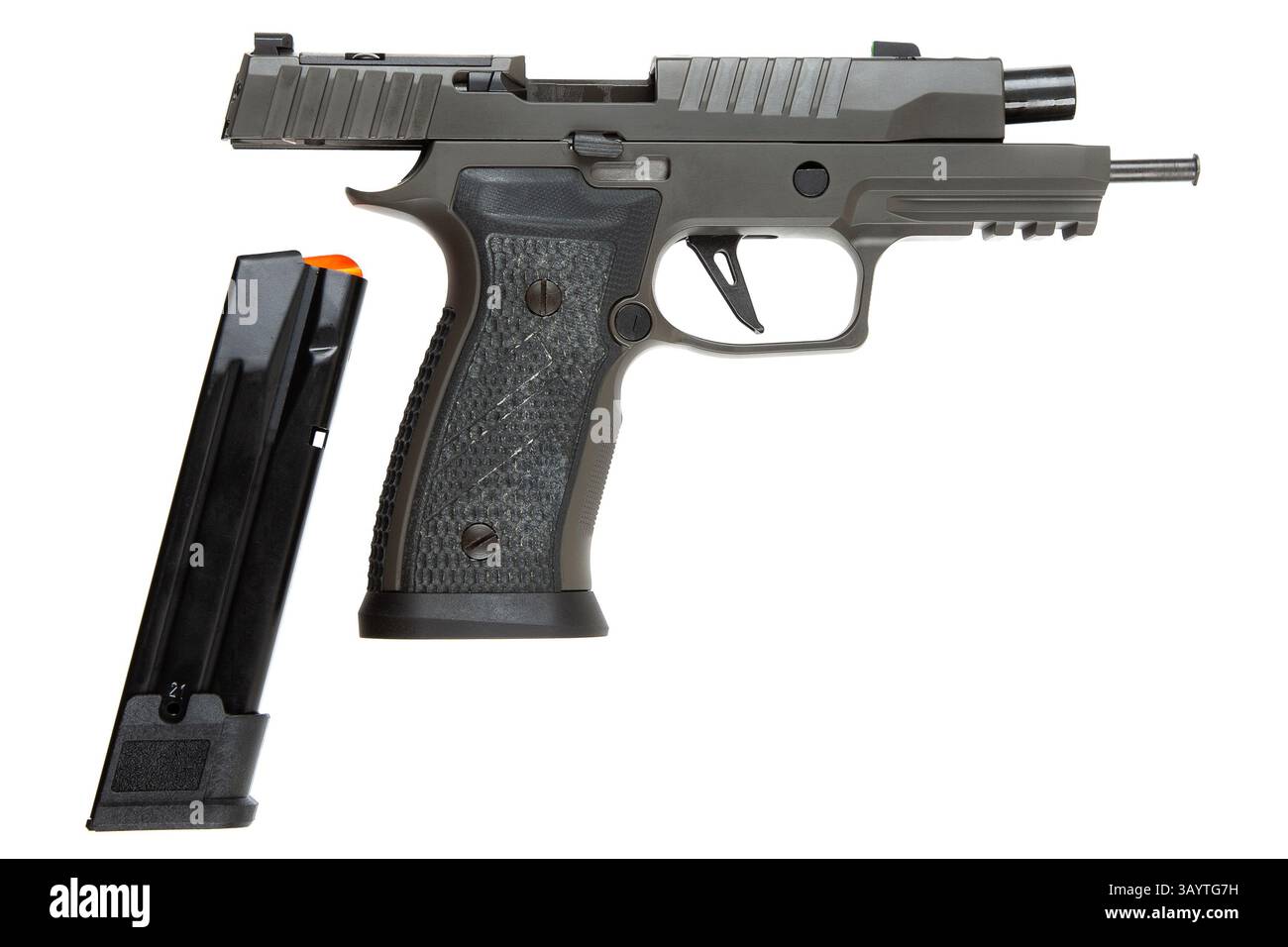 Tactical semi-automatic pistol with slide retracted and magazine ...