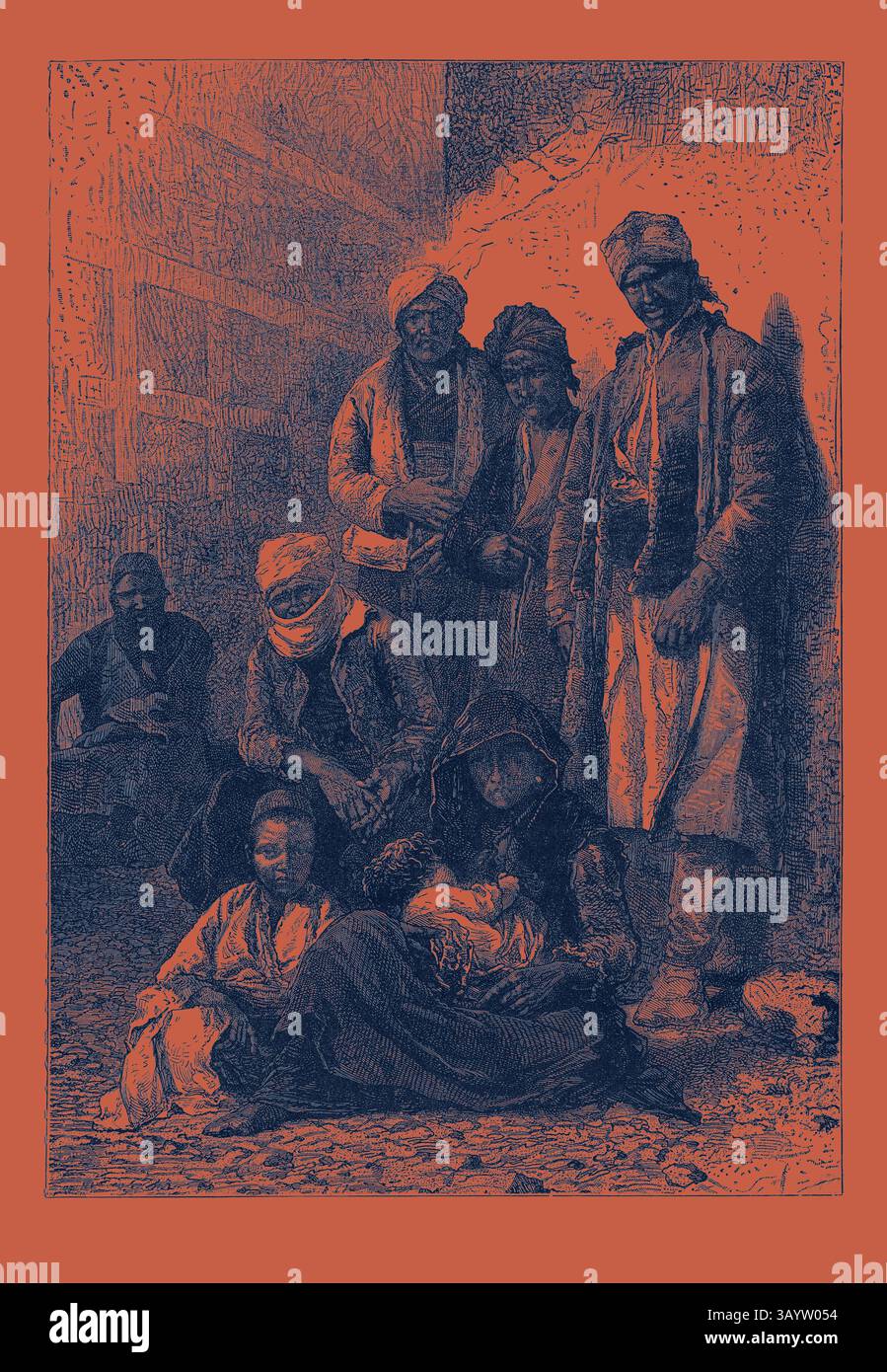 A group of individuals, dressed in traditional garments, gather closely ...