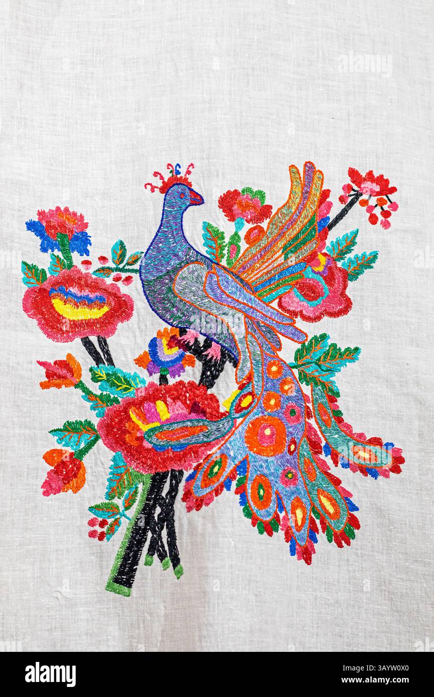 embroidered bird with flowers on traditional embroidery in Ukraine ...