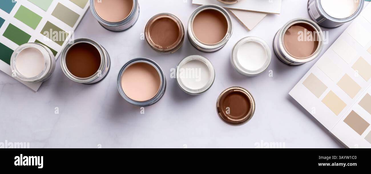 Tiny sample paint cans during house renovation, process of choosing ...