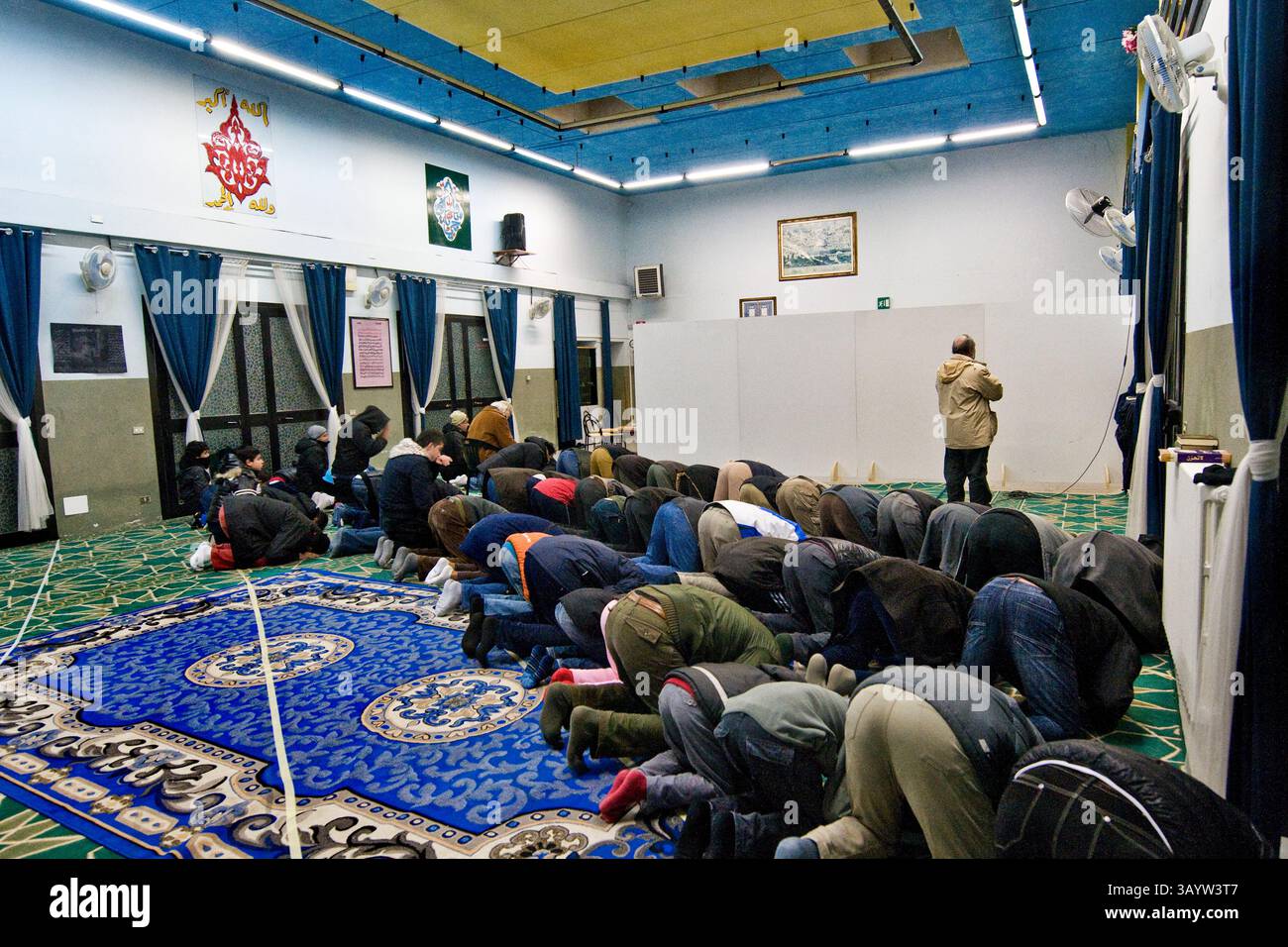 The afternoon prayer. Al-Rahmàn Mosque, Segrate, Italy Stock Photo - Alamy