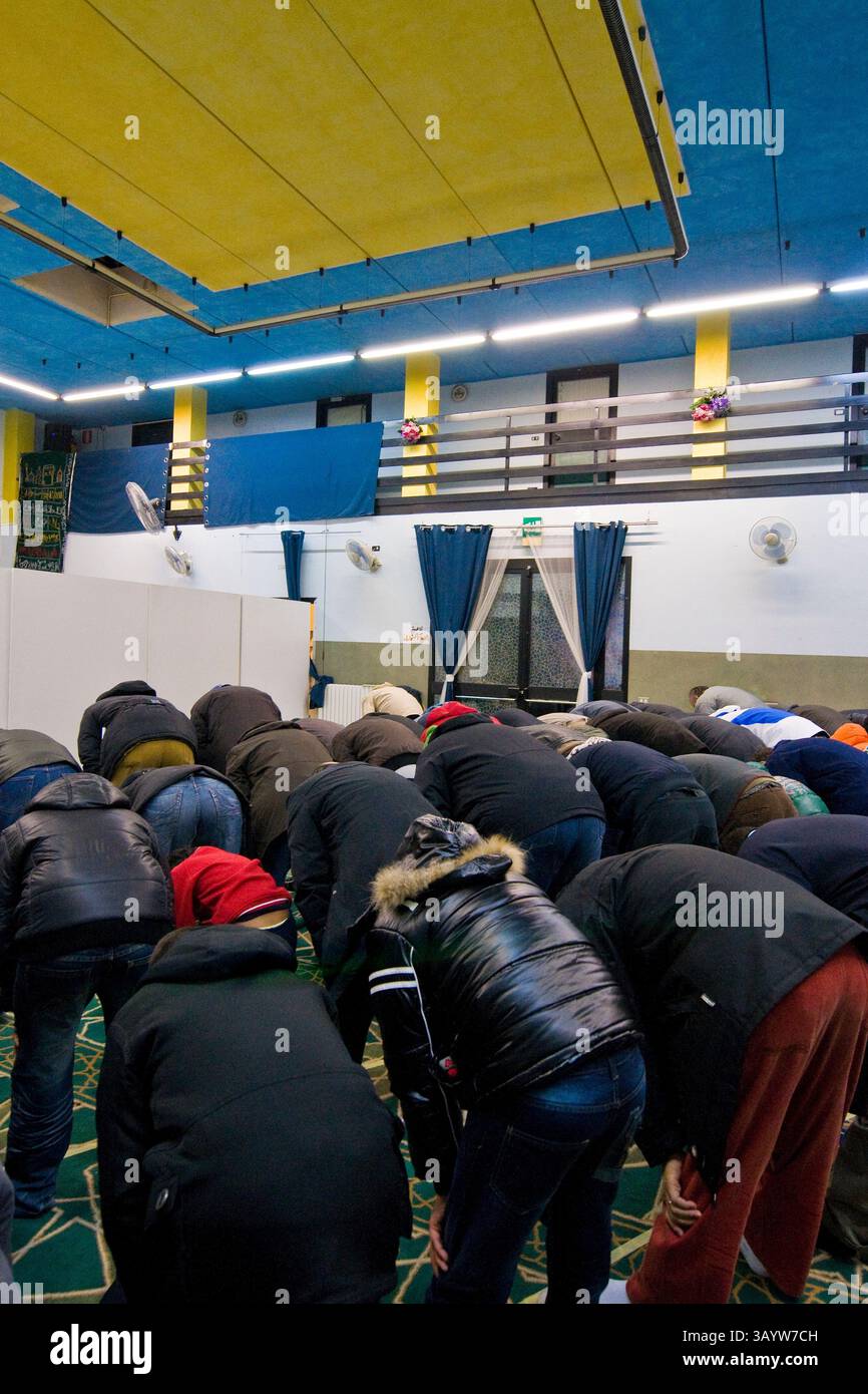 The afternoon prayer. Al-Rahmàn Mosque, Segrate, Italy Stock Photo - Alamy
