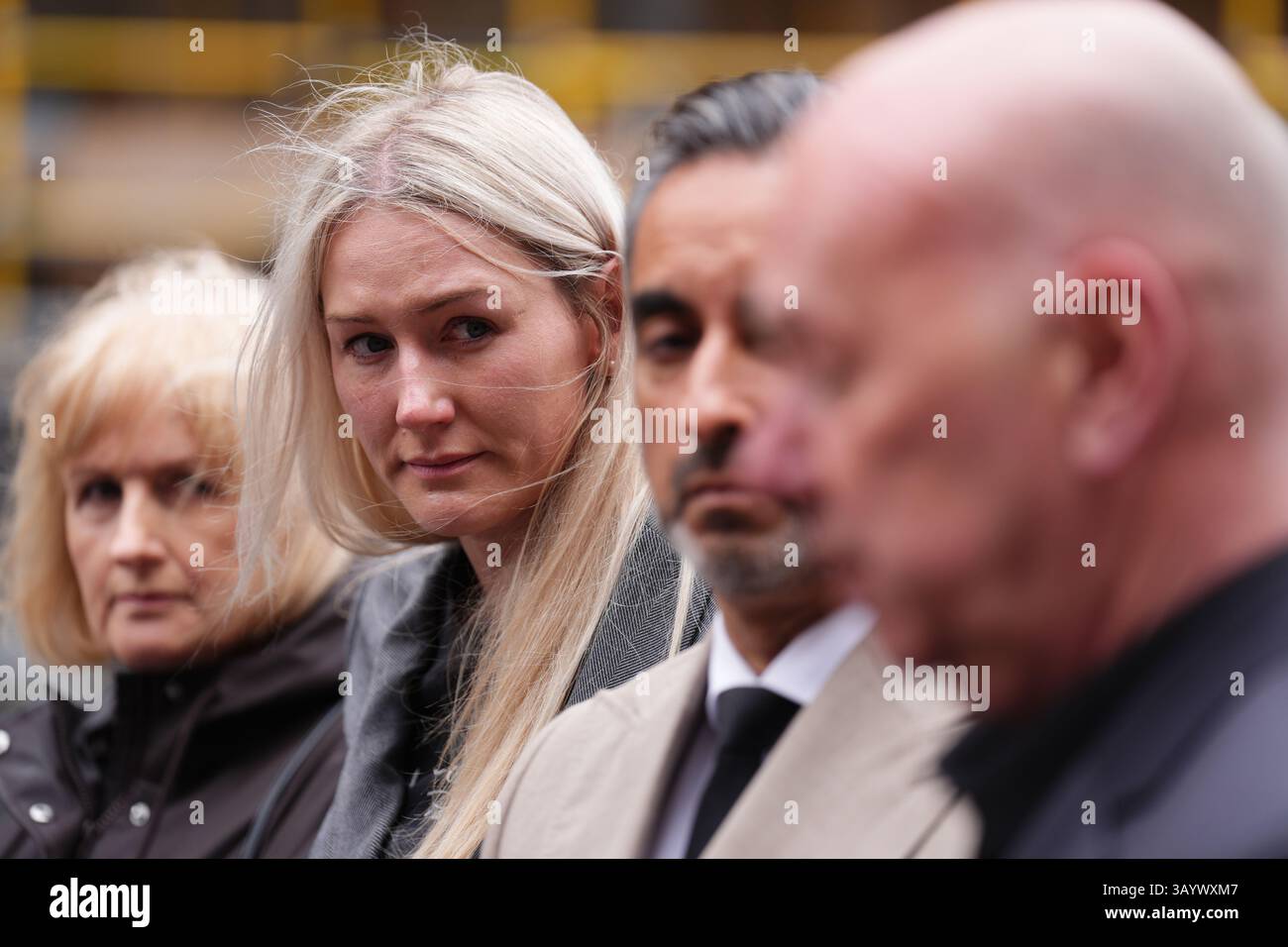 Frances Marr , sister of Calum Inglis looks on as Alan Inglis father of ...