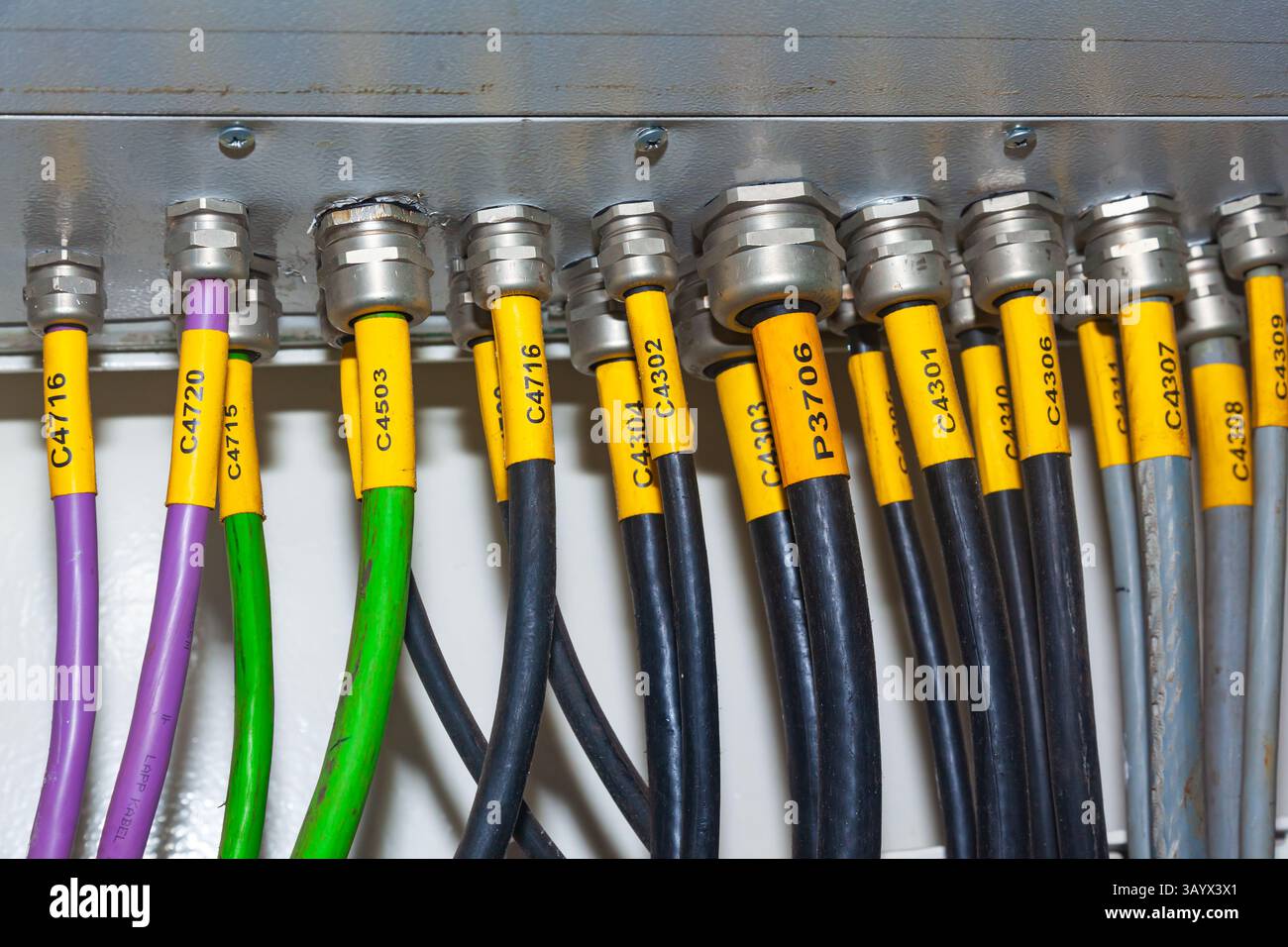 Several powerful electrical cables connected to a junction box Stock ...