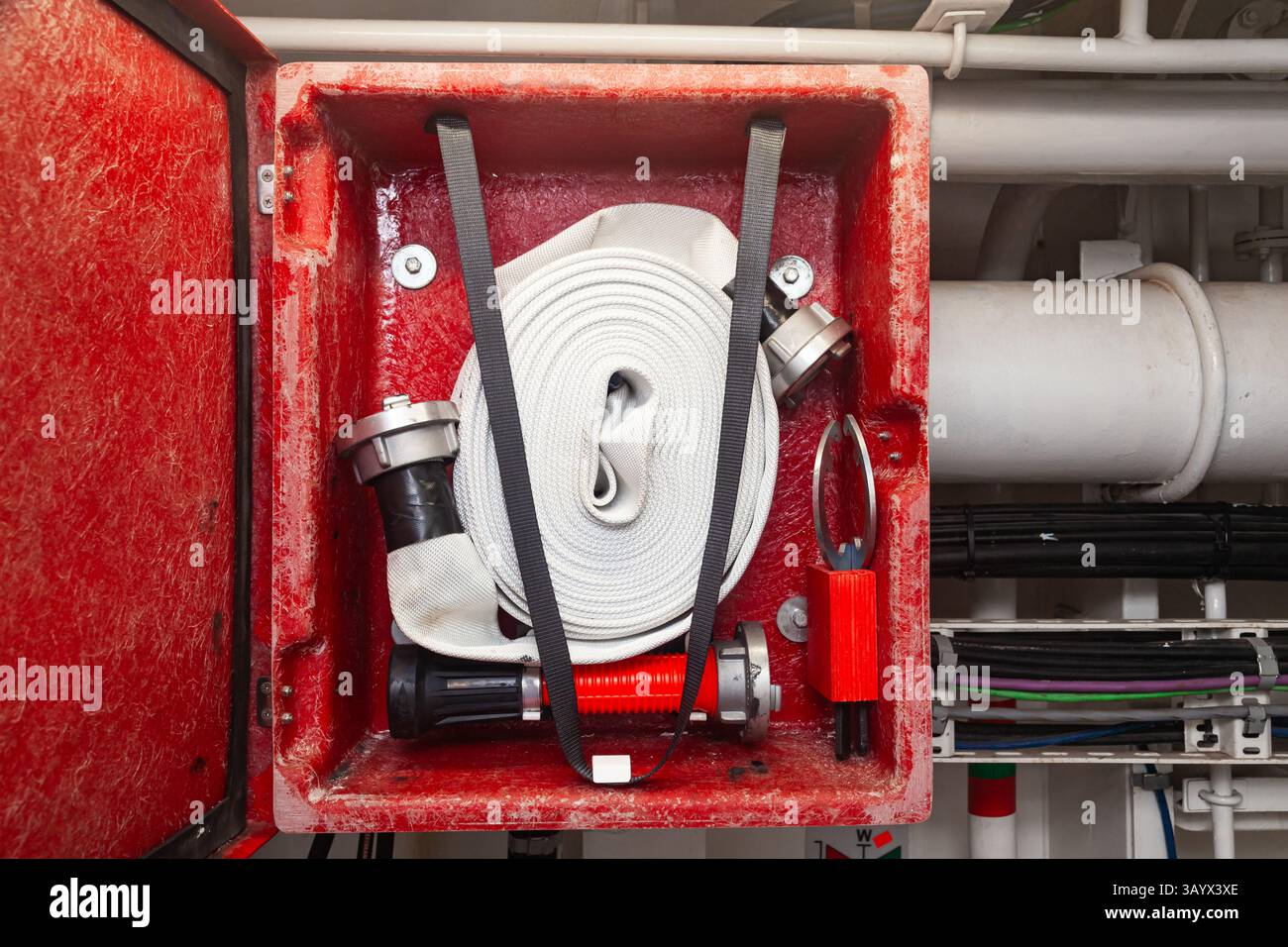 Fire hose reel hi-res stock photography and images - Alamy