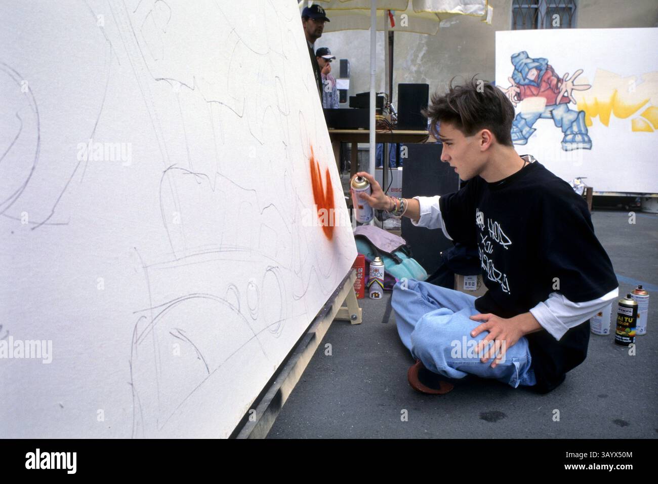 Young people. Graffiti artist Stock Photo - Alamy