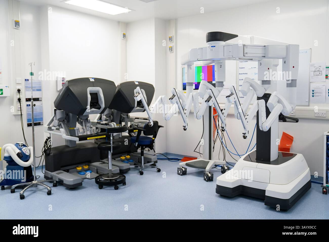 A robotic surgical system pictured ahead of a state-of-the-art robot ...