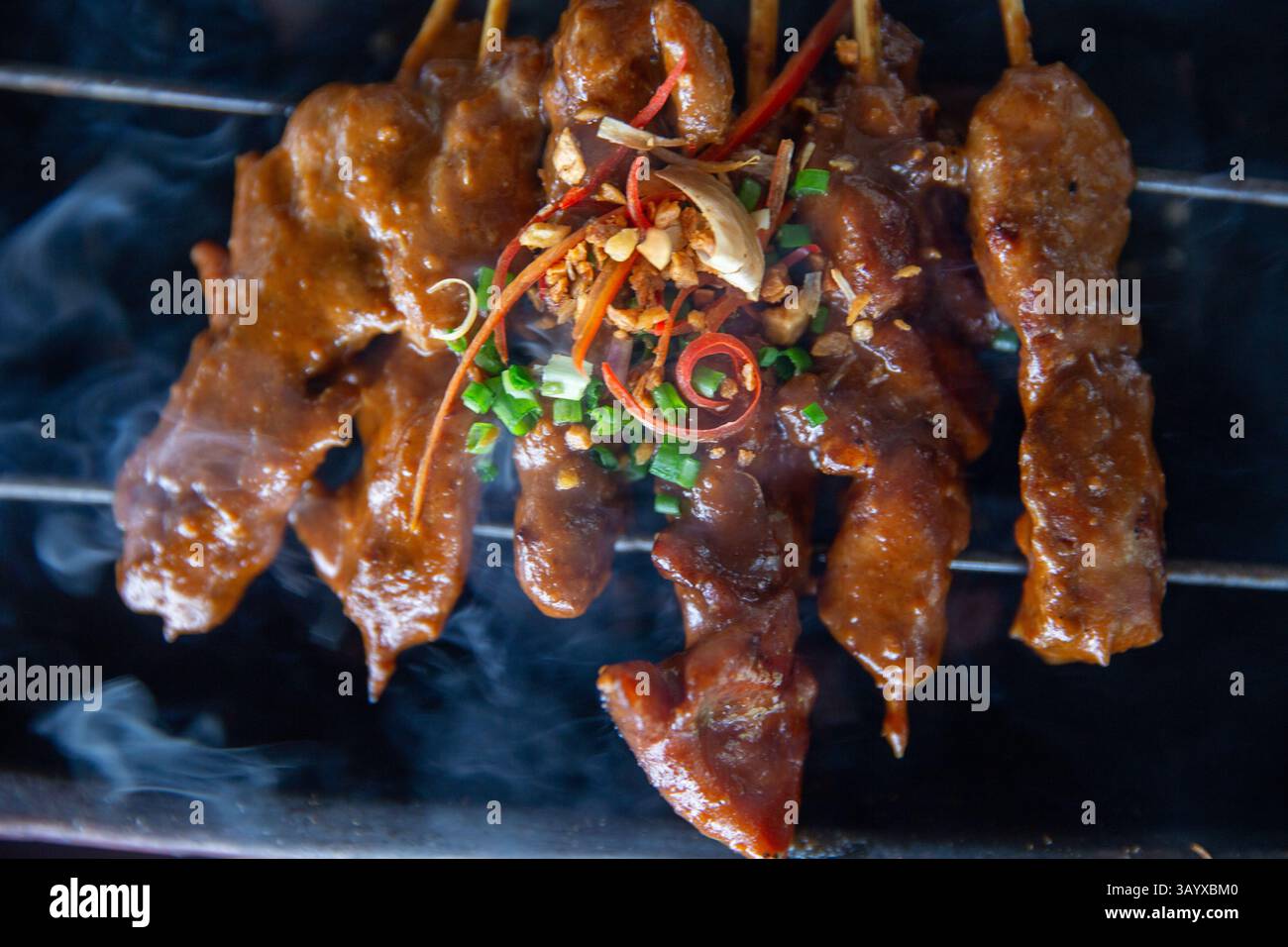 Chicken satay served peanut hi-res stock photography and images - Alamy