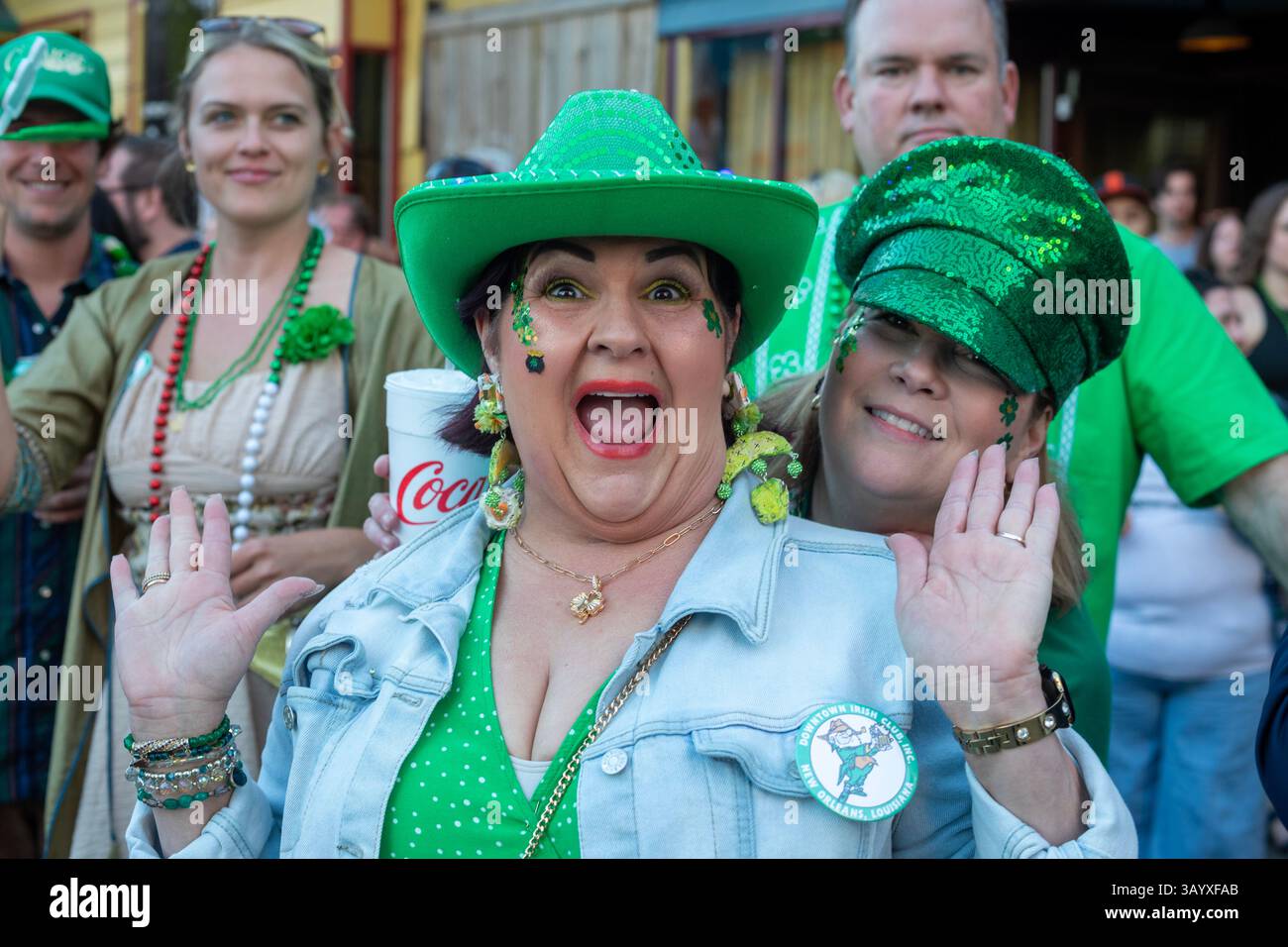 New Orleans, Louisiana - Spectators line the sidewalks as the Downtown ...