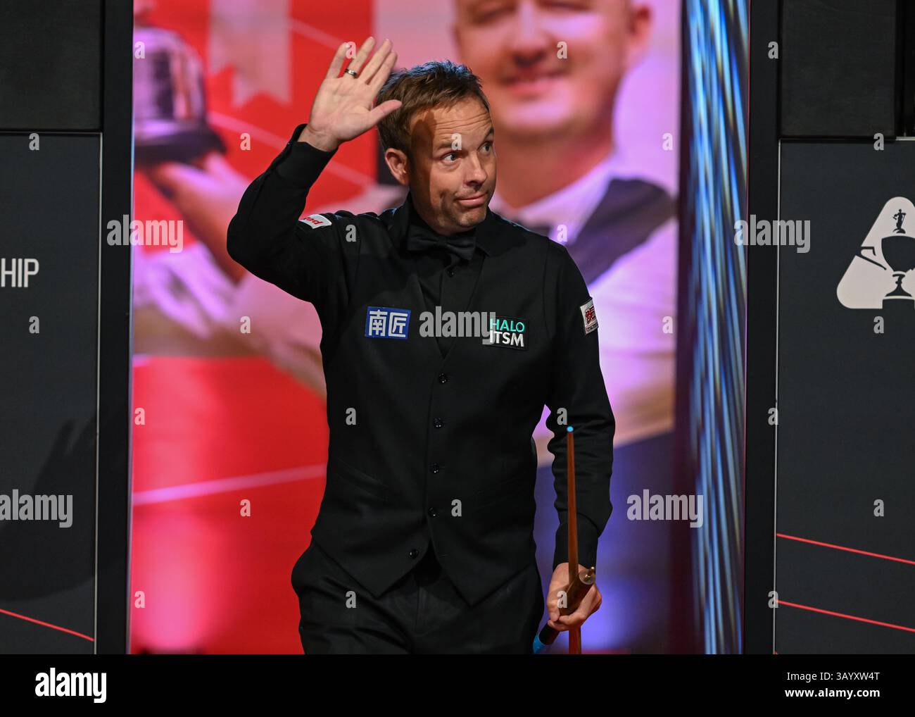 Sheffield, UK. 23rd Apr, 2025. Ali Carter walks out ahead of his Round ...