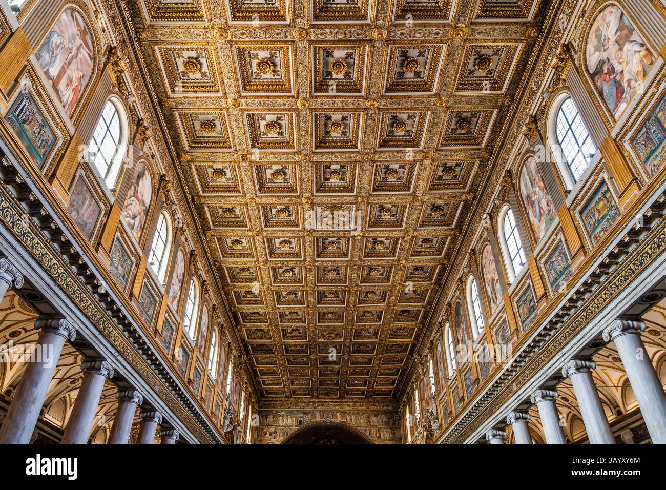 Ornate golden coffered ceiling of the Papal Basilica of Santa Maria ...