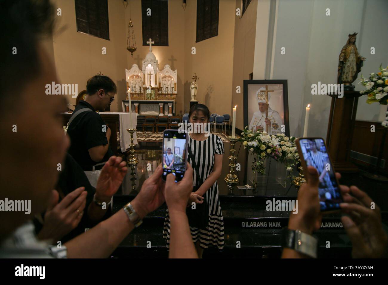 Bandung, West Java, Indonesia. 23rd Apr, 2025. Catholics pose with a ...