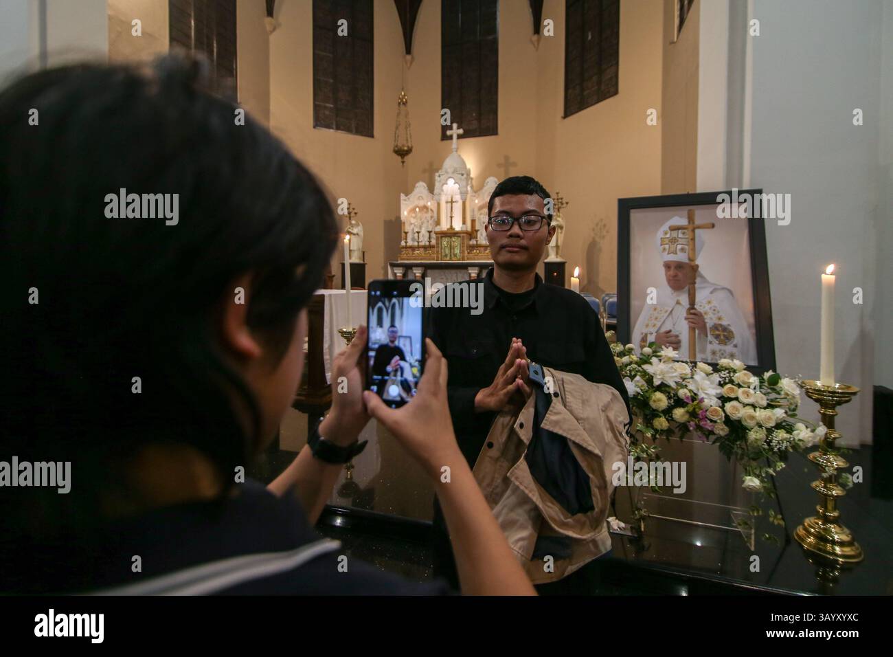 Bandung, West Java, Indonesia. 23rd Apr, 2025. Catholics pose with a ...