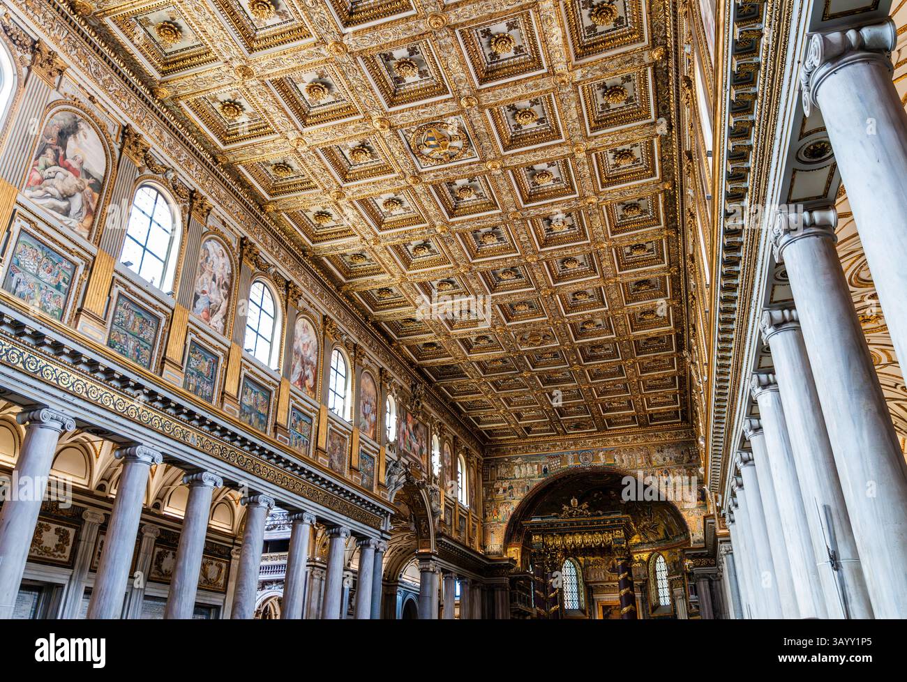 Ornate golden coffered ceiling of the Papal Basilica of Santa Maria ...