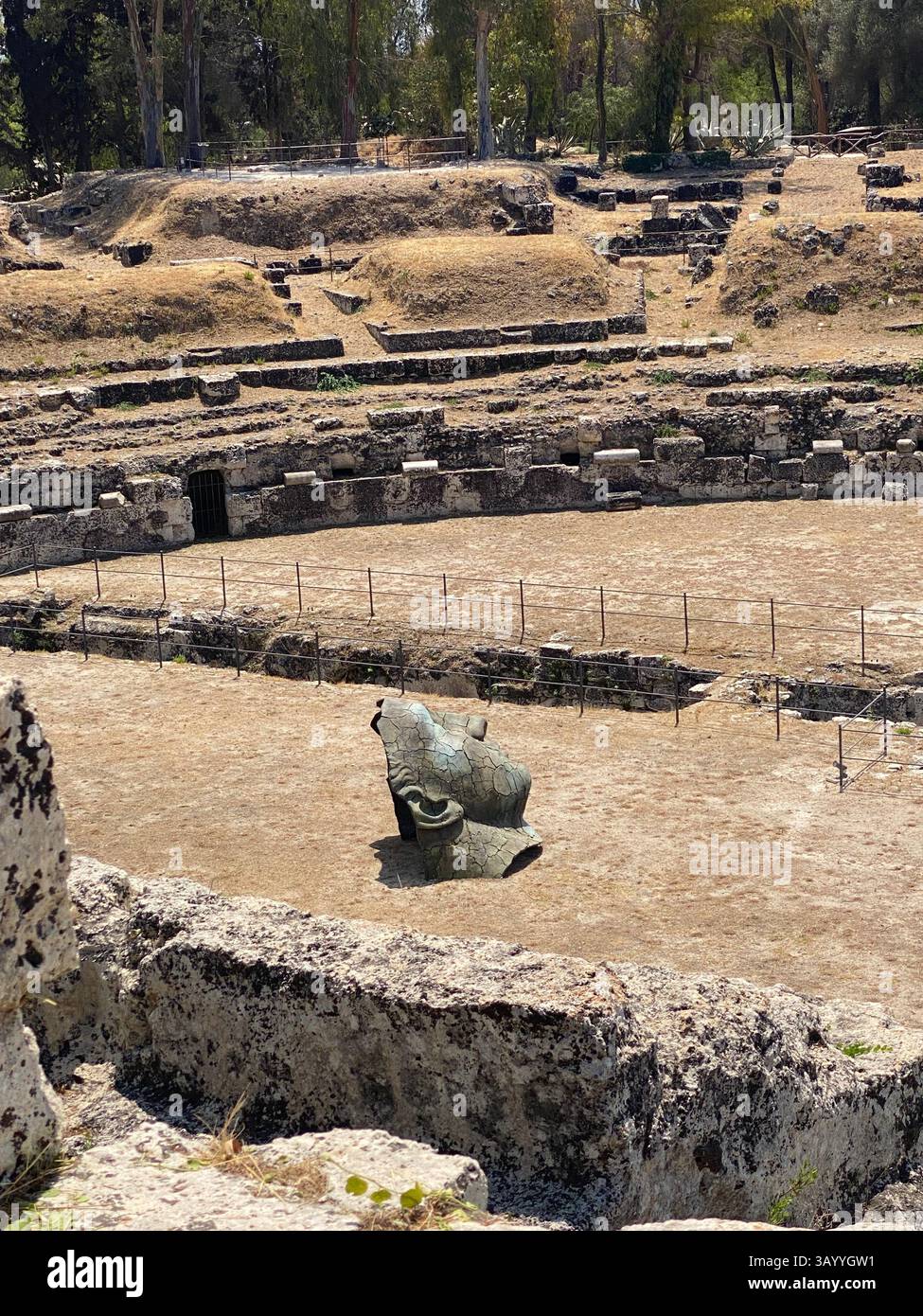 Historic stone amphitheater of Syracuse featuring contemporary ...
