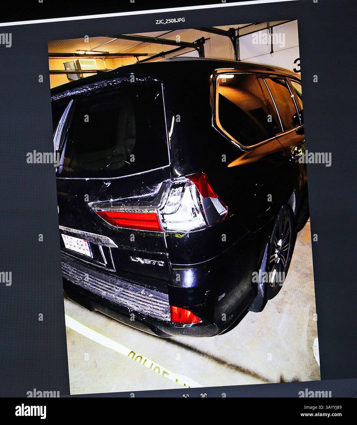 An image of Karen Read's SUV with a damaged taillight which was put into evidence is shown ...