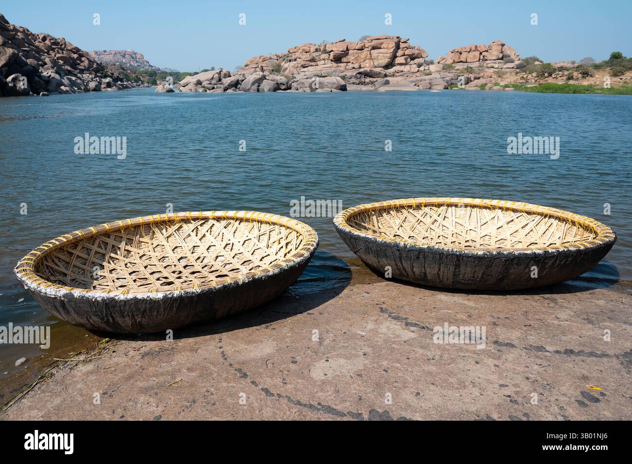 Coracle boats at the Tungabhadra River in Hampi, India, traditional ...