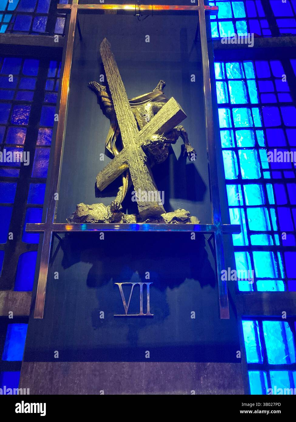 Inside Liverpool Metropolitan Cathedral. Jesus on a cross next to ...