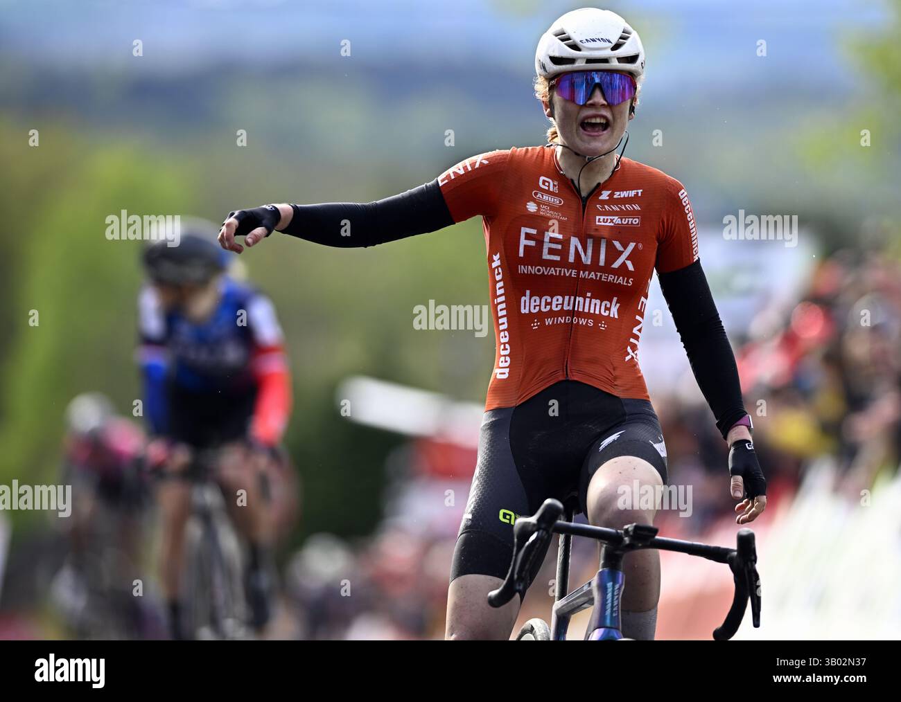 Dutch Puck Pieterse of Fenix-Deceuninck celebrates after winning the ...