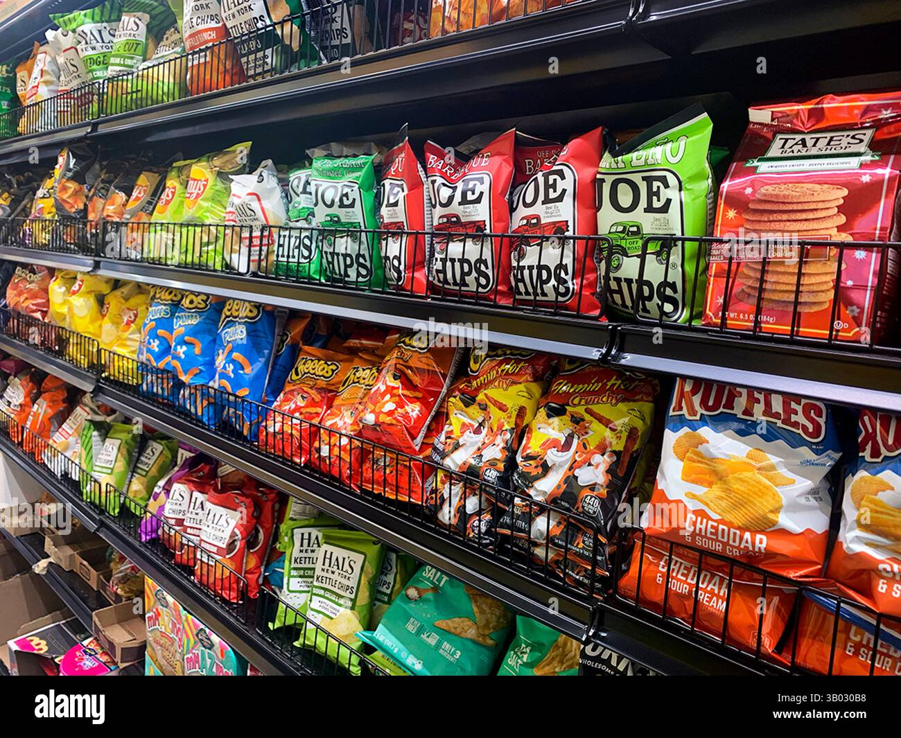 Selection of salty snacks in store Stock Photo - Alamy