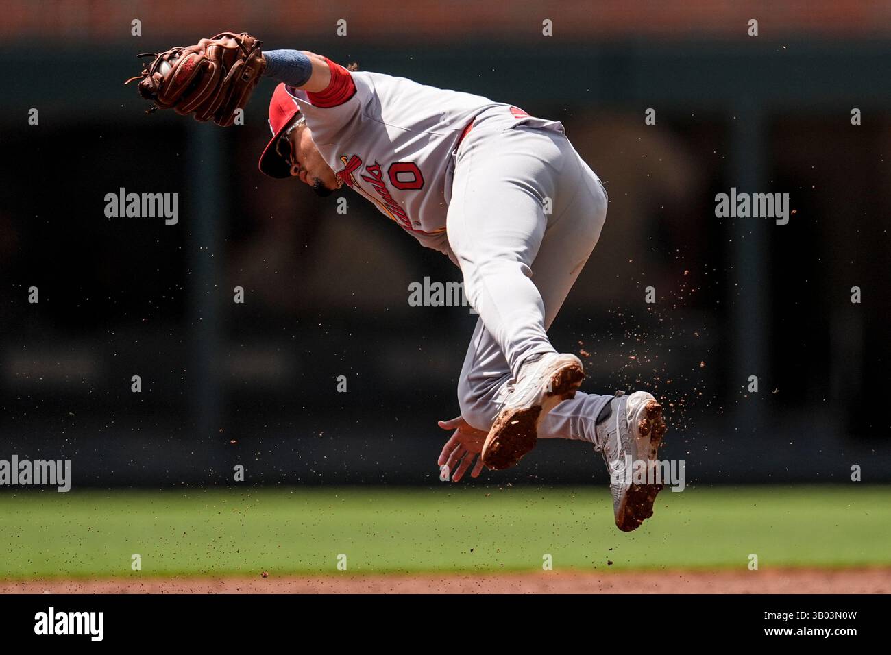 St. Louis Cardinals' Masyn Winn makes the tag on Atlanta Braves' Nick ...