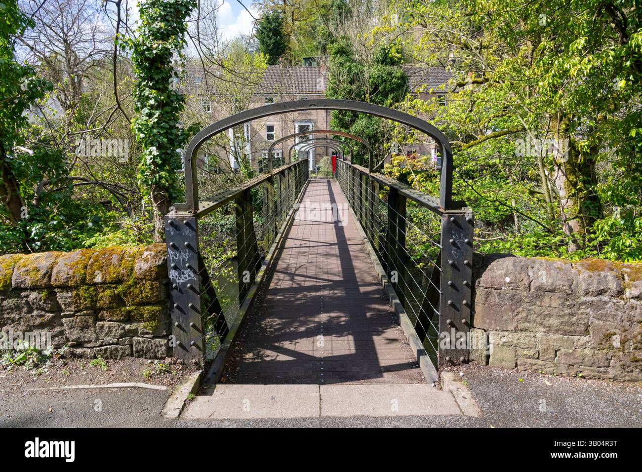 Footbridge over the river Derwent in Matlock Bath, Derbyshire, England ...