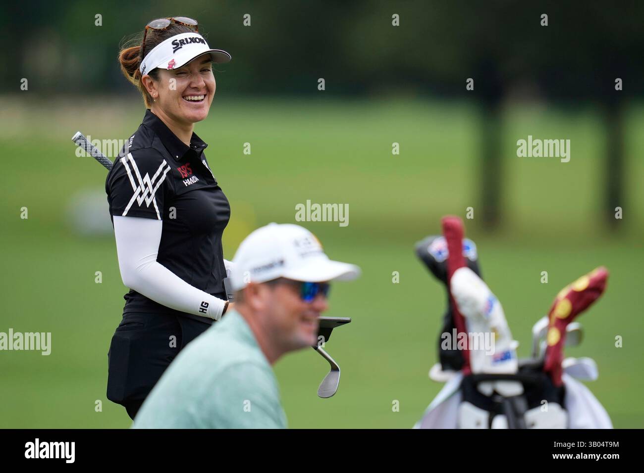 Hannah Green, of Australia, prepares to work on the driving range ...
