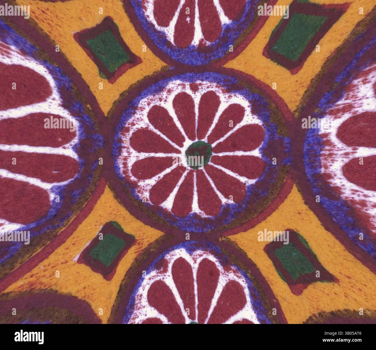 A vibrant geometric pattern featuring intricate floral designs, with ...