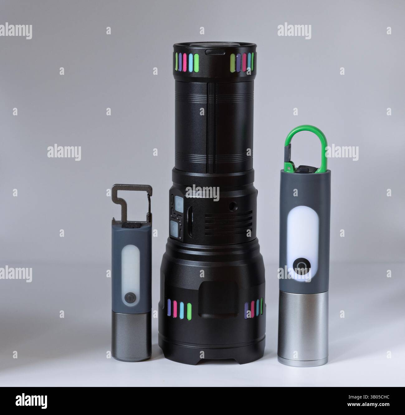 three portable lighting devices, Portable Lighting, Emergency Light ...