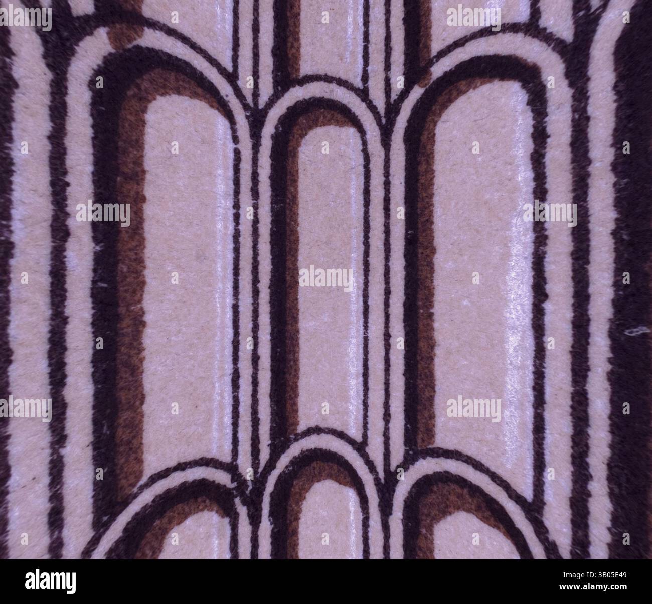 A close-up view of a textured surface featuring a series of vertical ...