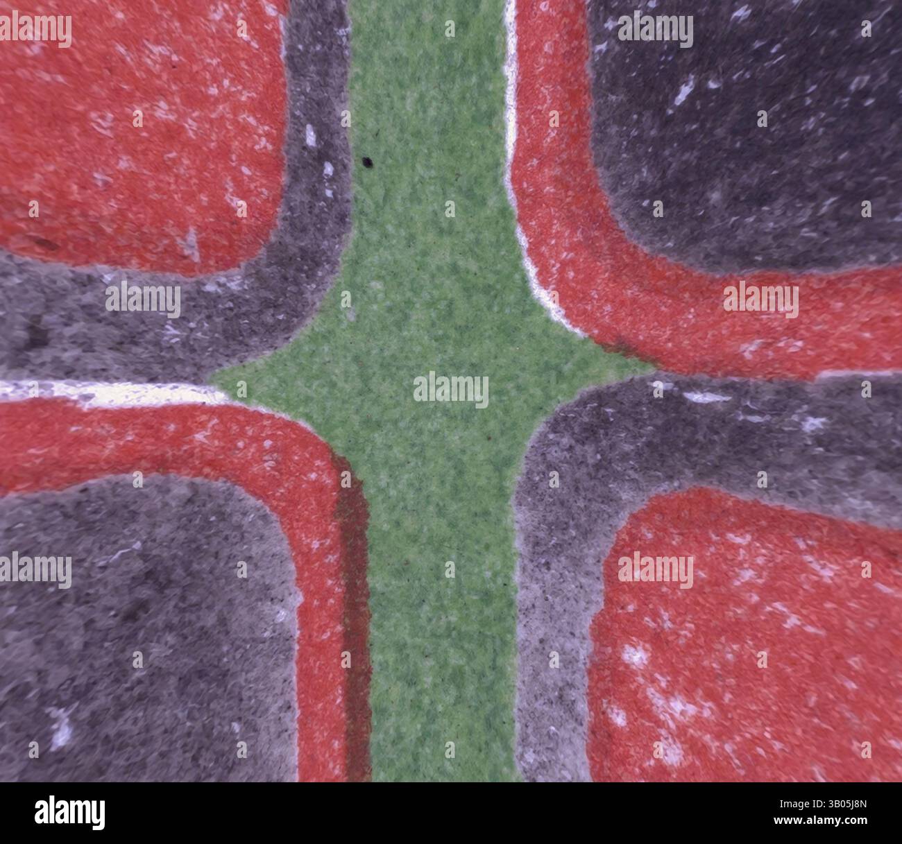 A close-up view of textured surfaces featuring alternating blocks of ...